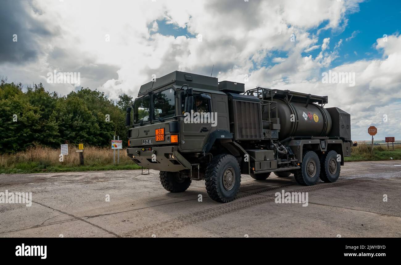 British army M.A.N. unit support tanker in action on a military ...