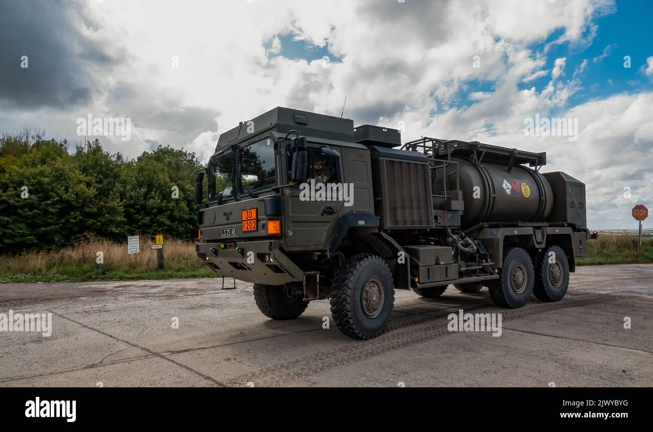 British army M.A.N. unit support tanker in action on a military ...