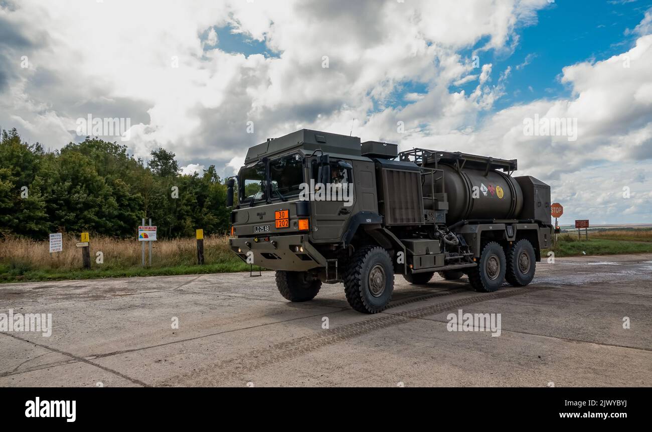 British army M.A.N. unit support tanker in action on a military ...