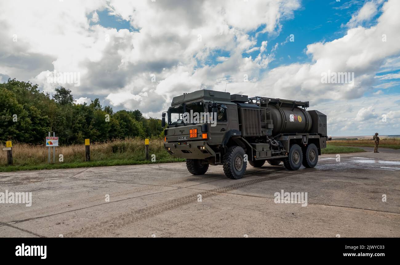 British army M.A.N. unit support tanker in action on a military ...