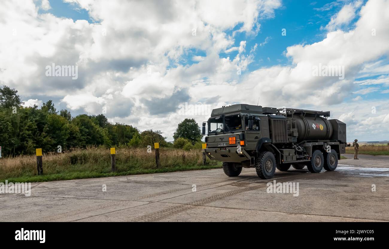 British army M.A.N. unit support tanker in action on a military ...