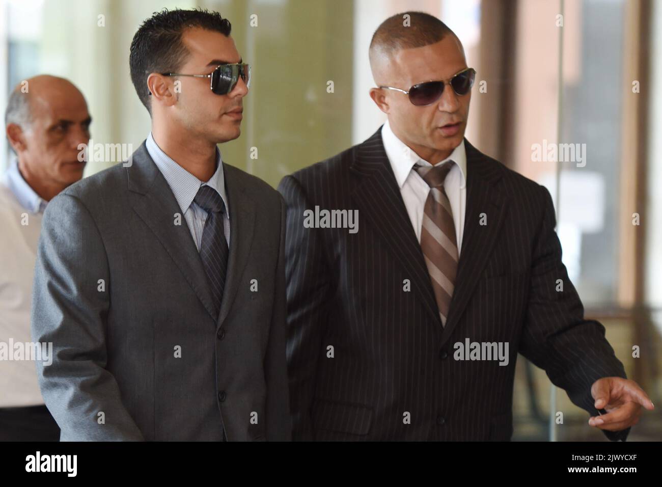Nasser Dib (left) arrives with his lawyer Adam Houda for a sentencing ...