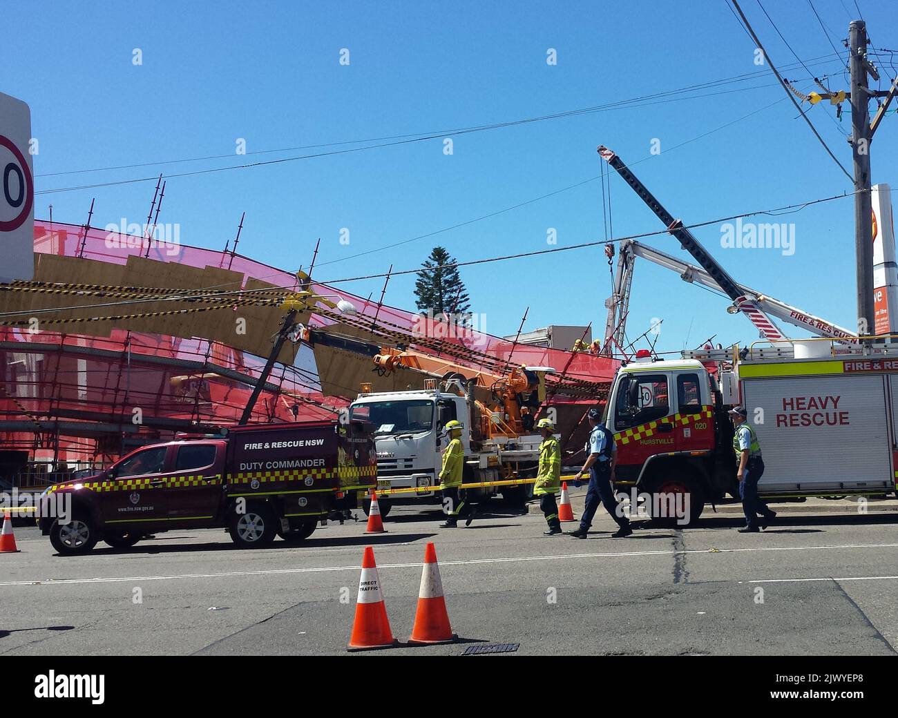 Firefighters at the scene of a building collapse in Sydney's South ...