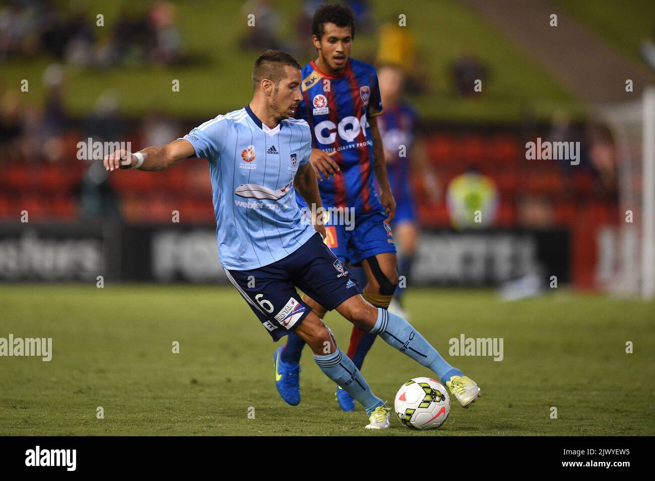 Nikola Petkovic of Sydney FC competes for possession with Mitch Cooper ...