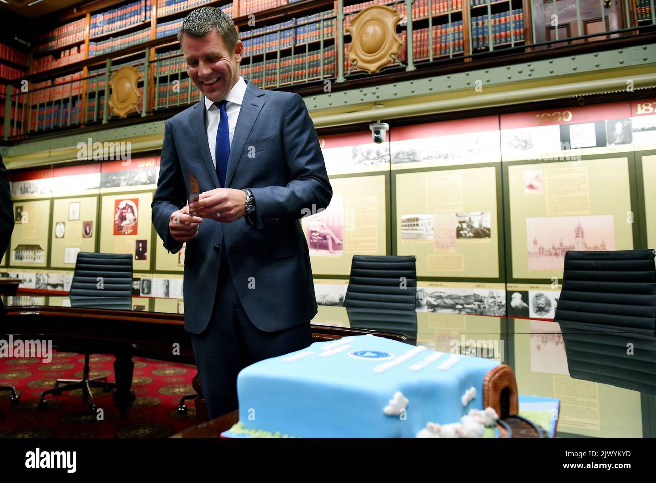 NSW Premier Mike Baird, (right), is presented with a birthday cake at ...