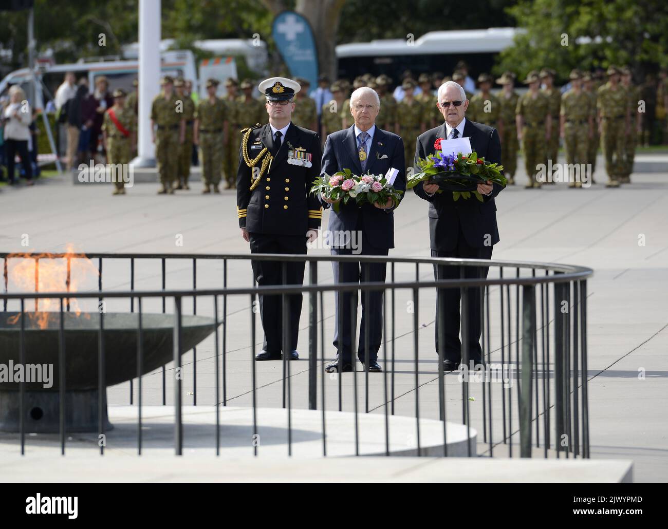Governor of Victoria Alex Chernov (centre) lays a wreath during the ...