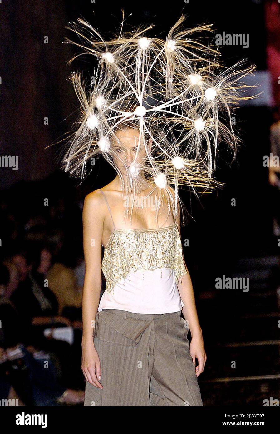 A model wears a Gwendolynne outfit during a runway parade at The ...