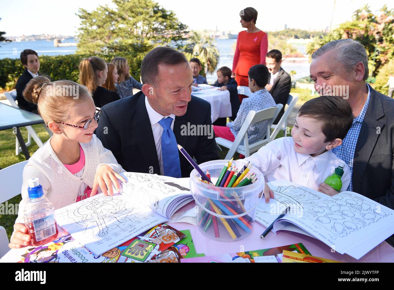 Prime Minister Tony Abbott along with his wife Margie, speaks with ...