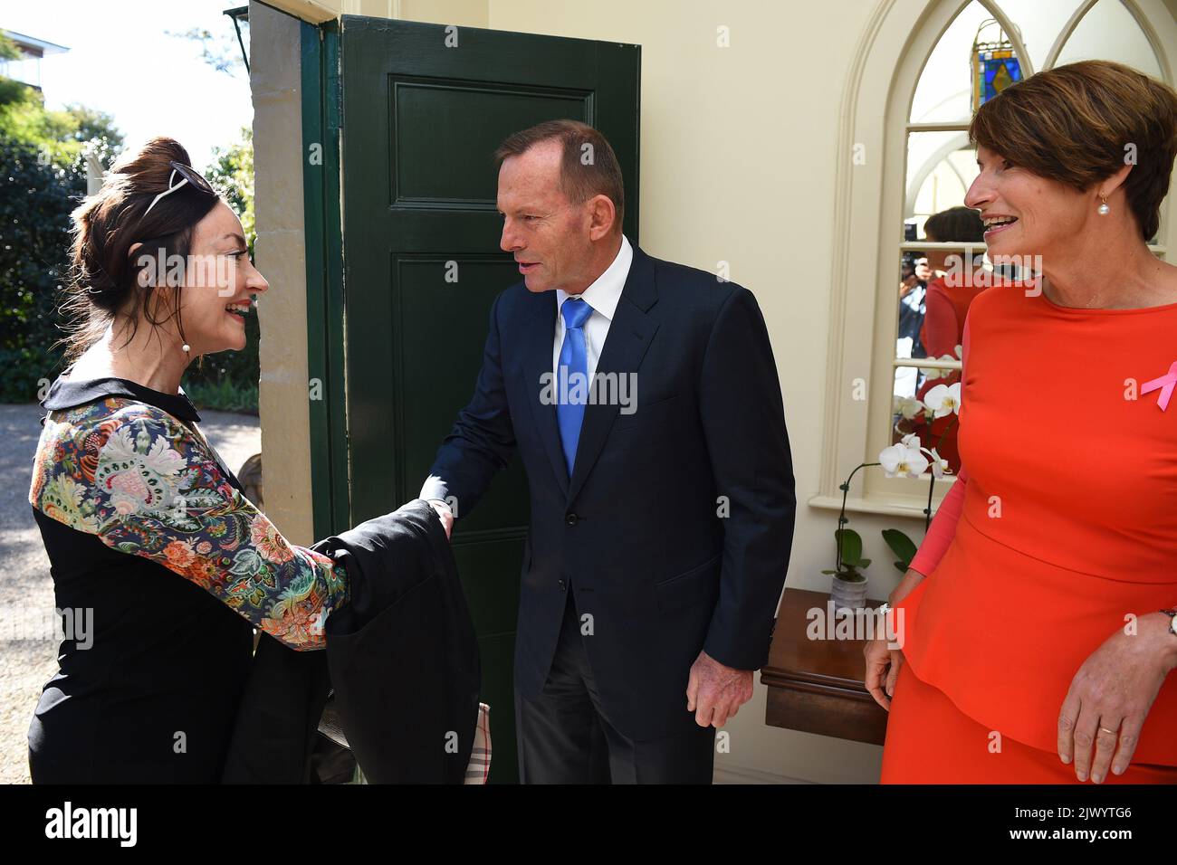 Prime Minister Tony Abbott along with his wife Margie, greet designer ...