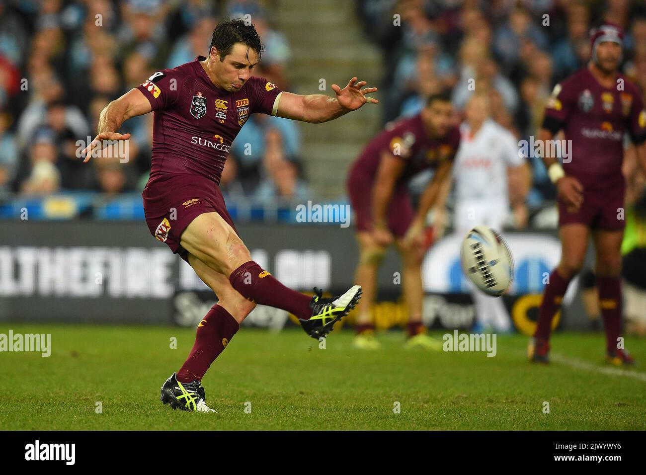 Cooper Cronk of the Maroons scores a field goal during State of Origin ...