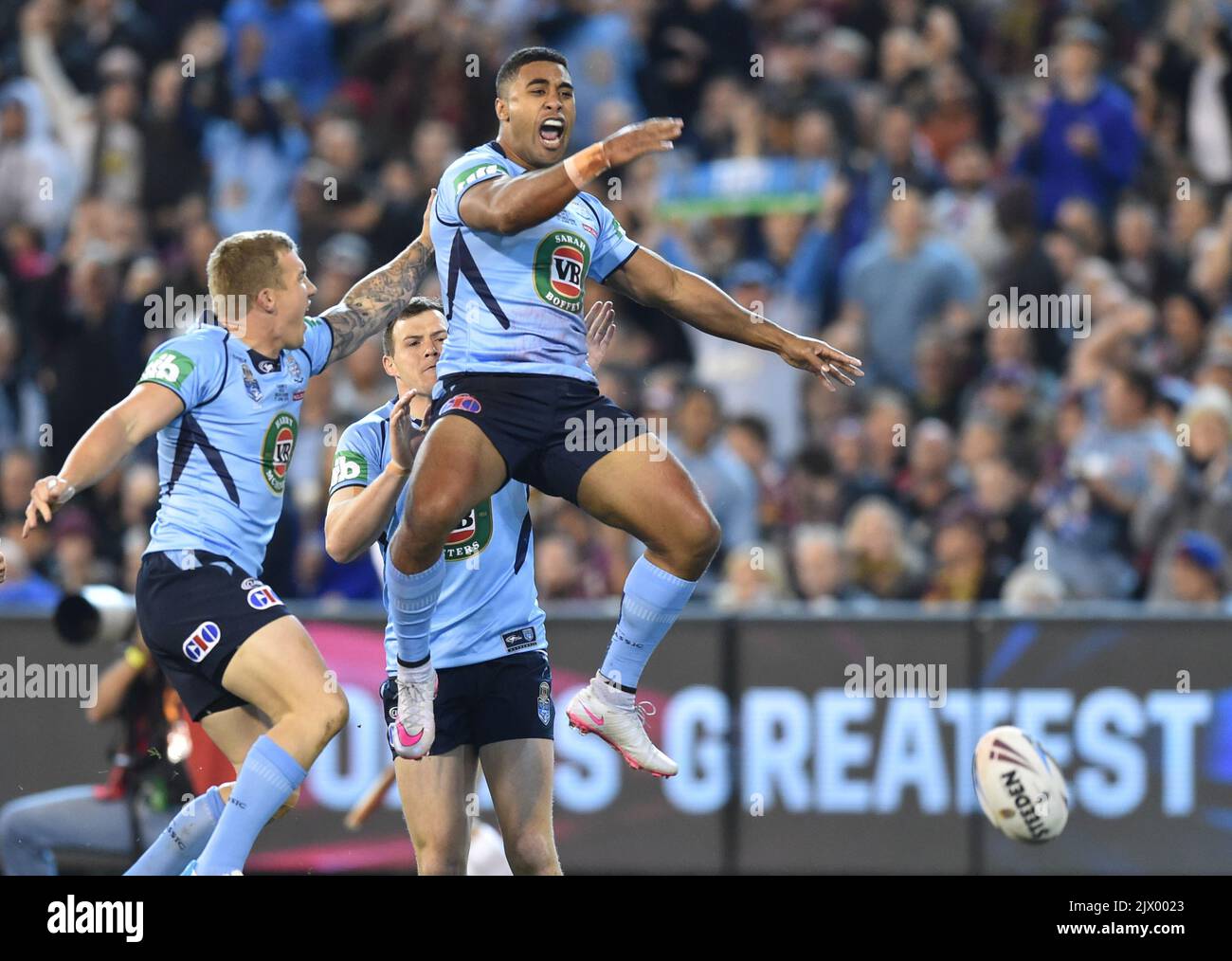 Michael Jennings of the Blues scores a try during State of Origin Game ...