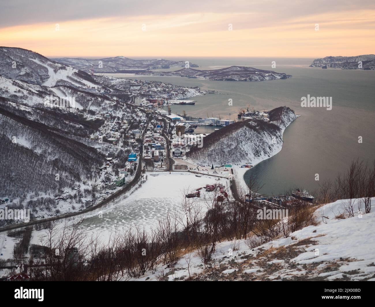 Small town and port on a sea chore and mountain coastline Stock Photo ...