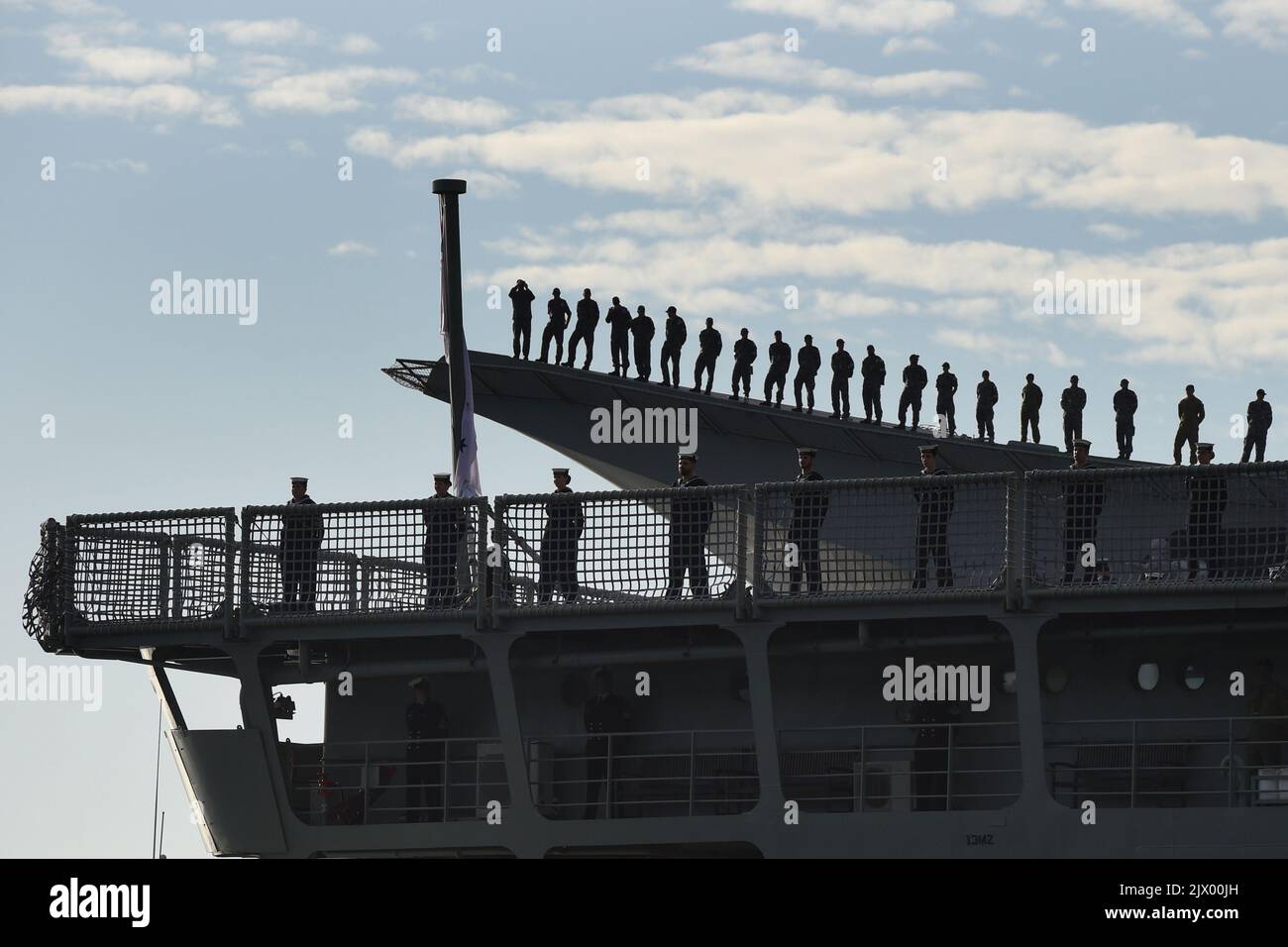 Crew onboard Australia's oldest Naval ship HMAS Tobruk (foreground) are ...