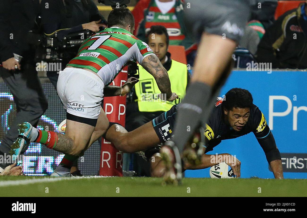 Panthers 's Waqa Blake scores a try during the round 17 NRL match ...
