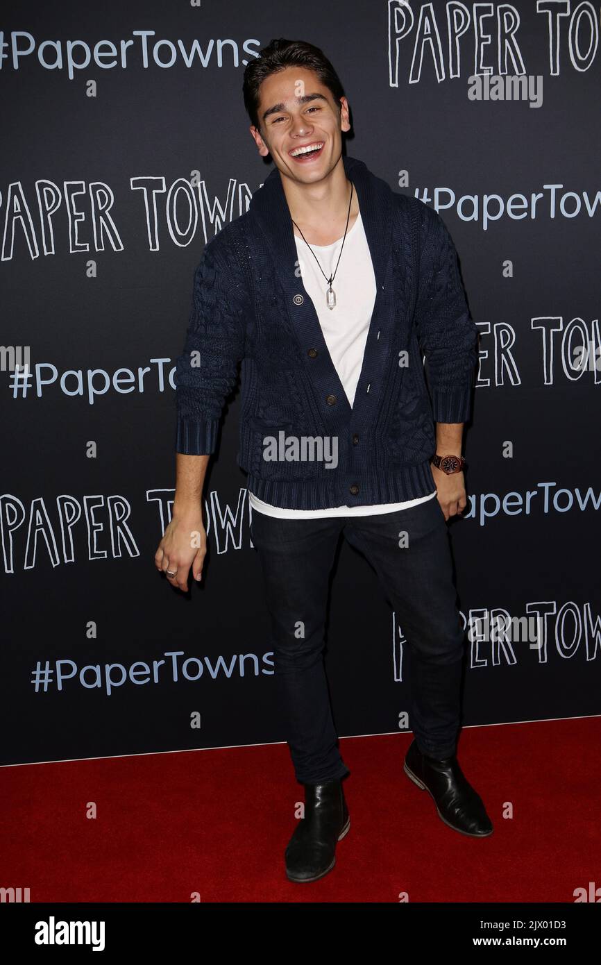 Actor Christian Antidormi walks the red carpet at the Paper Towns ...
