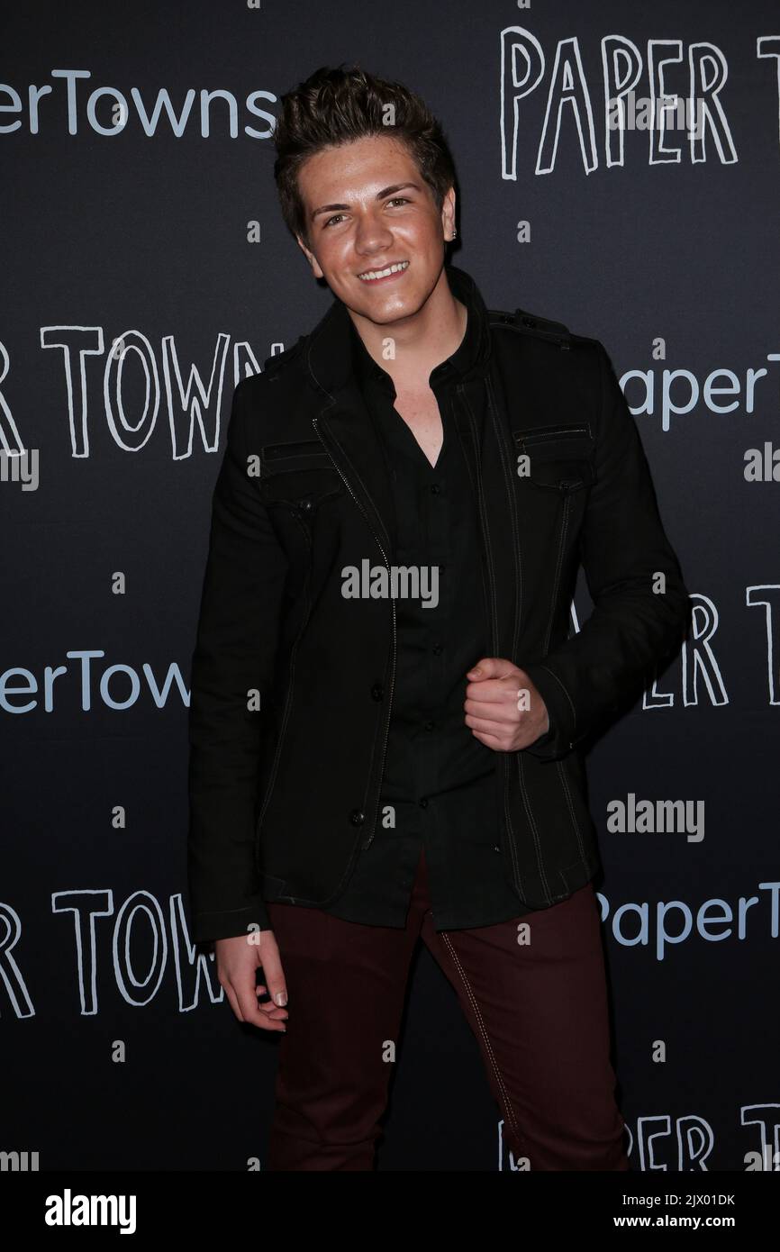 Singer Jordan Jansen walks the red carpet at the Paper Towns premiere ...