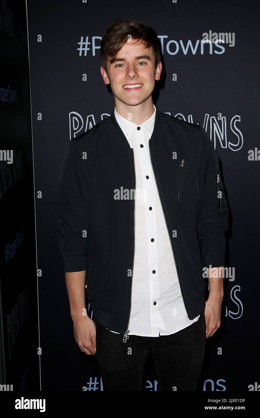 Connor Franta walks the red carpet at the Paper Towns premiere in ...