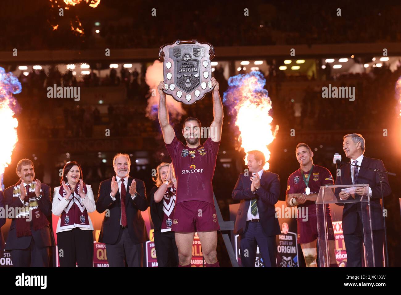 Cameron Smith of the Maroons celebrates with the winners shield during ...