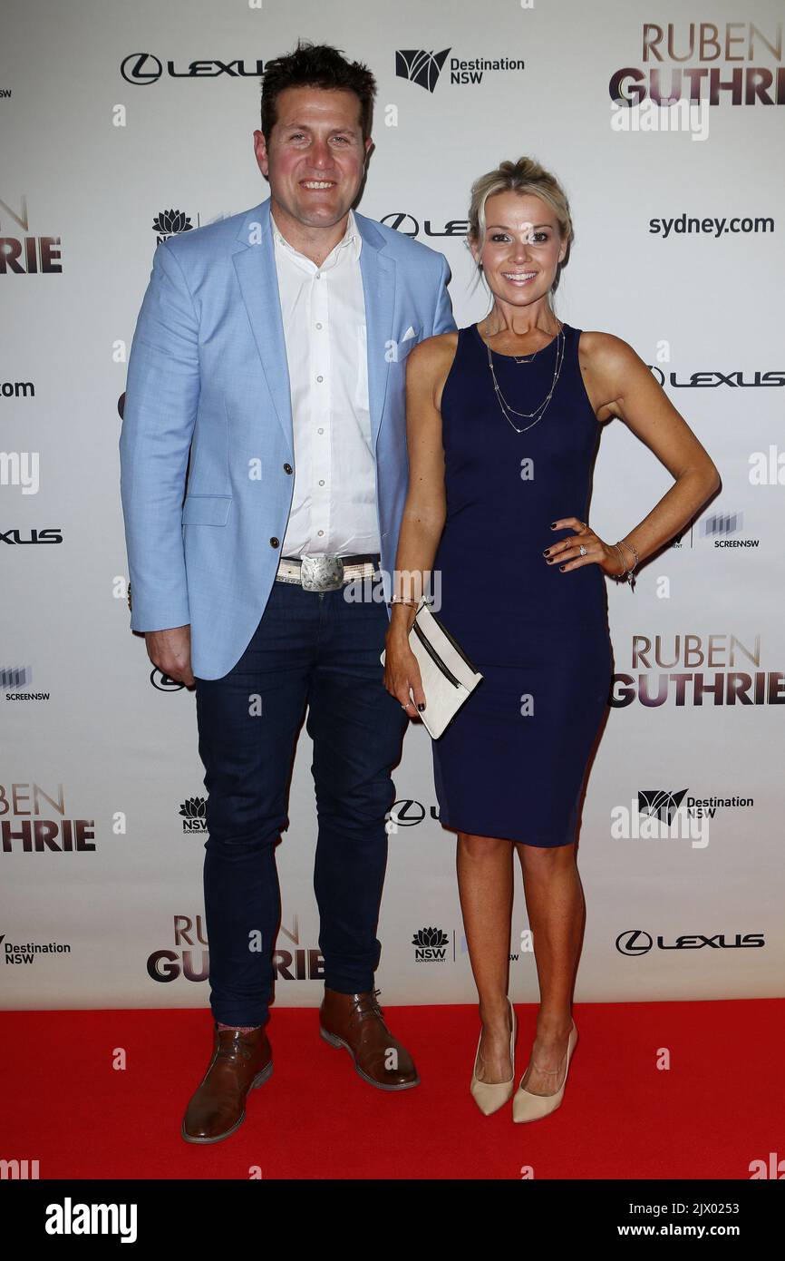Jason Stevens and wife Rebecca walk the red carpet at the premier of ...