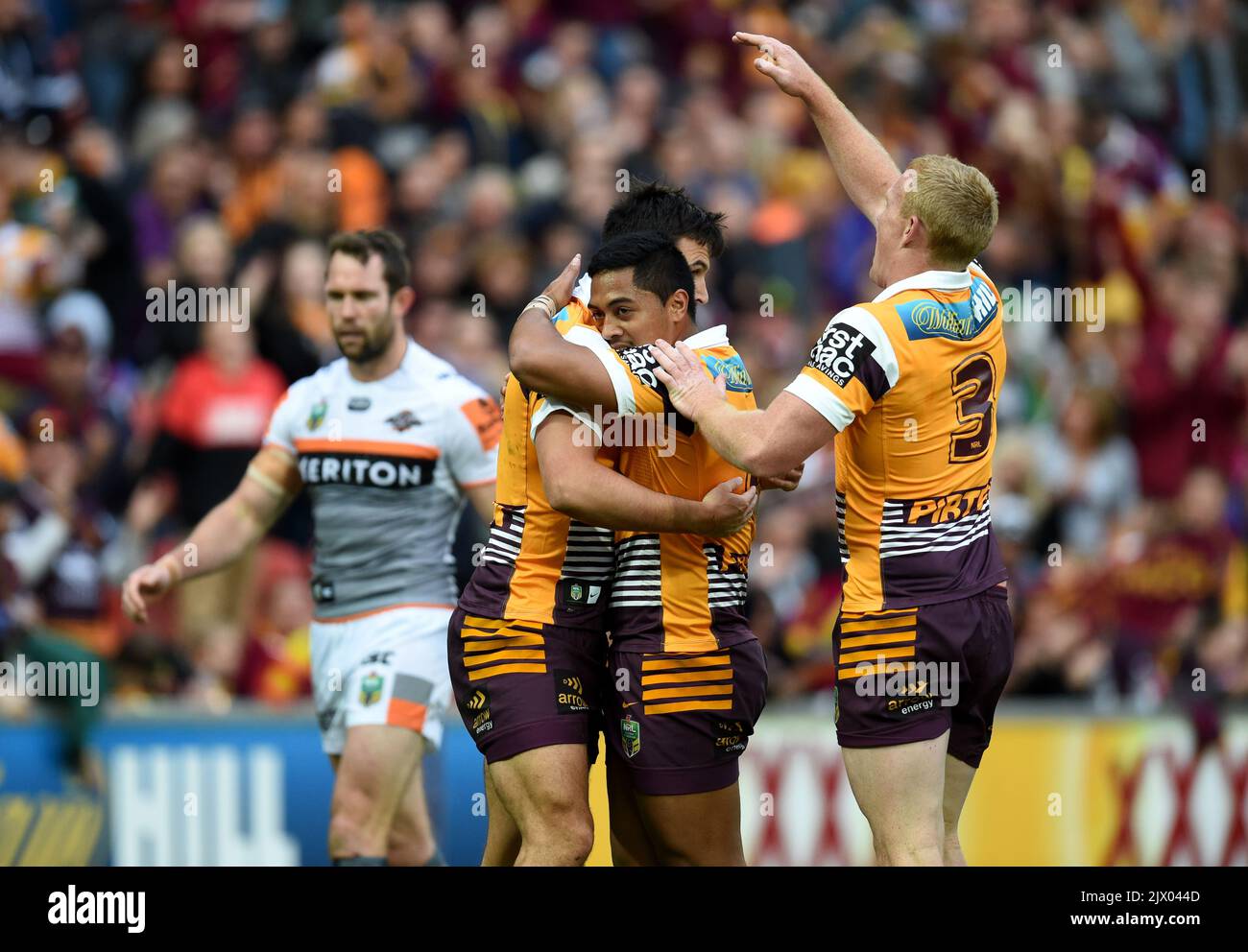 Brisbane Broncos players celebrates a try by Lachlan Maranta (left ...