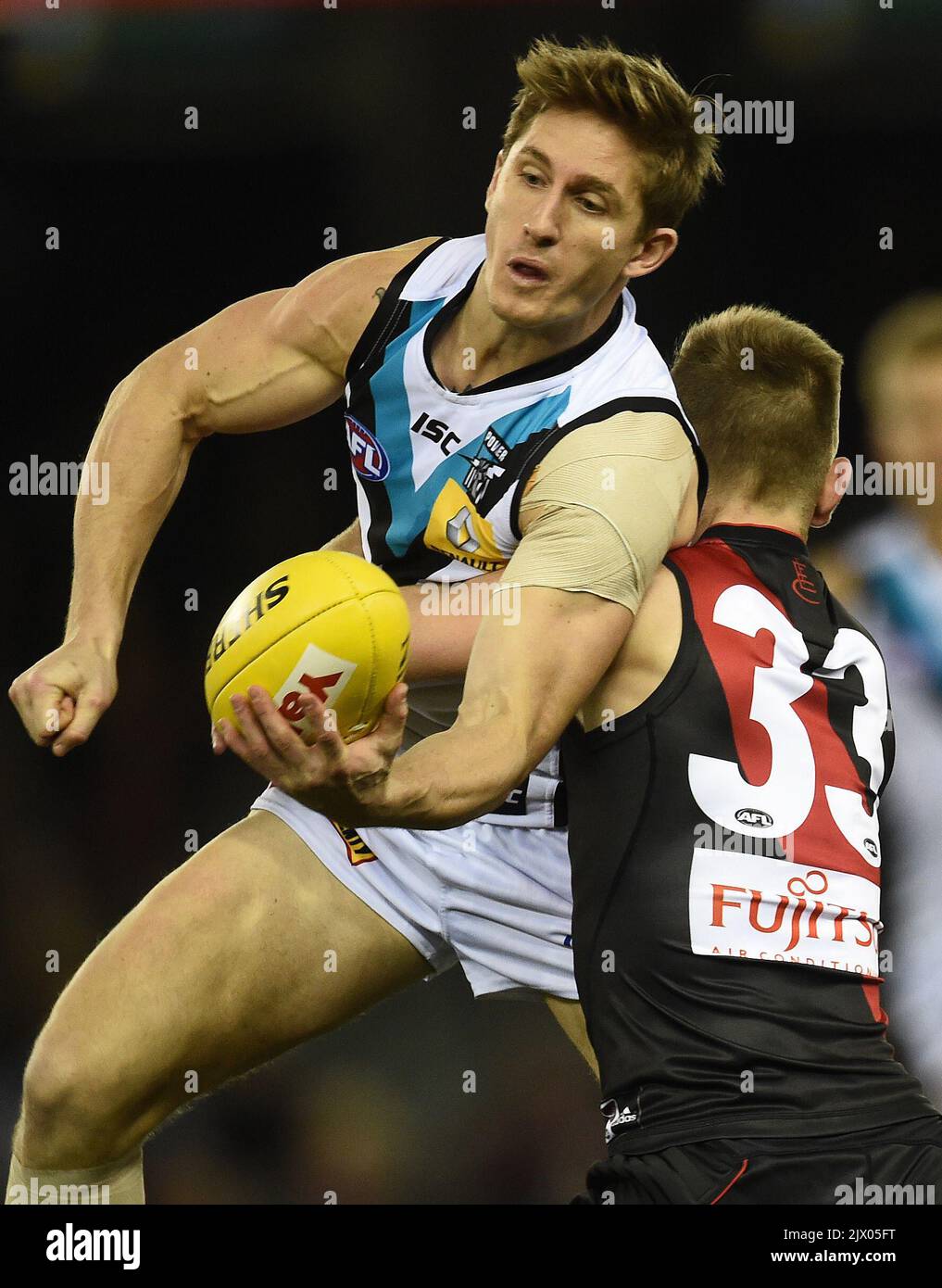 Port Adelaide Power player Hamish Hartlett (left) Essendon Bombers ...