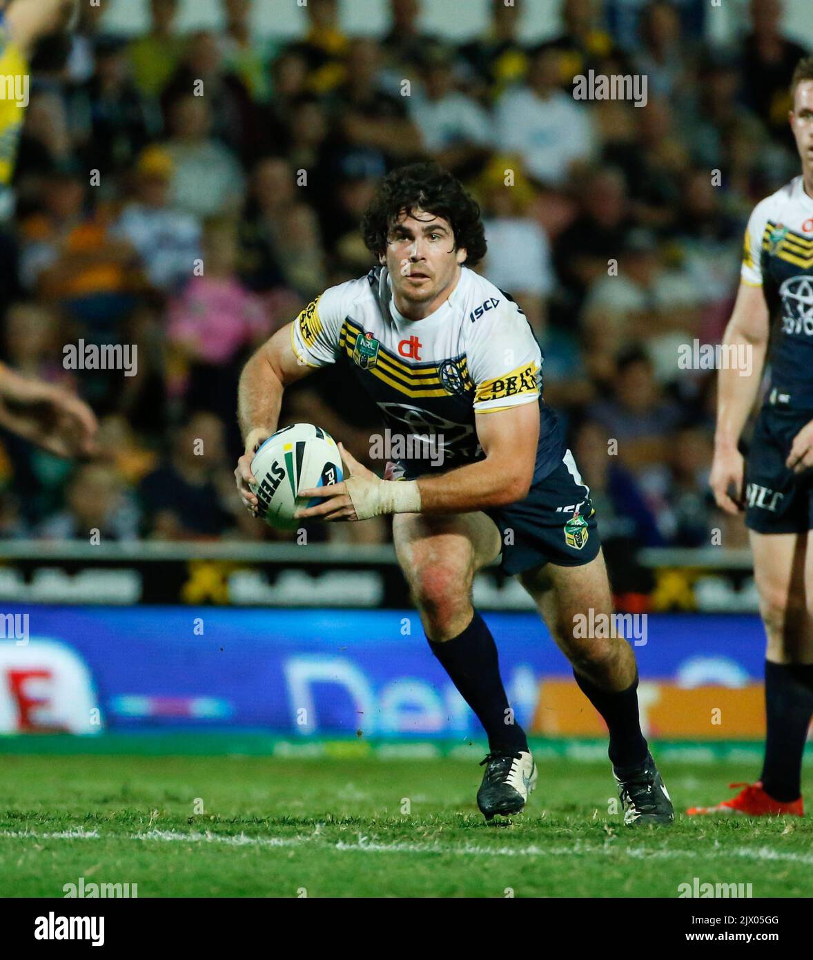 Cowboys Jake Granville takes the ball forward during round 20 NRL match ...