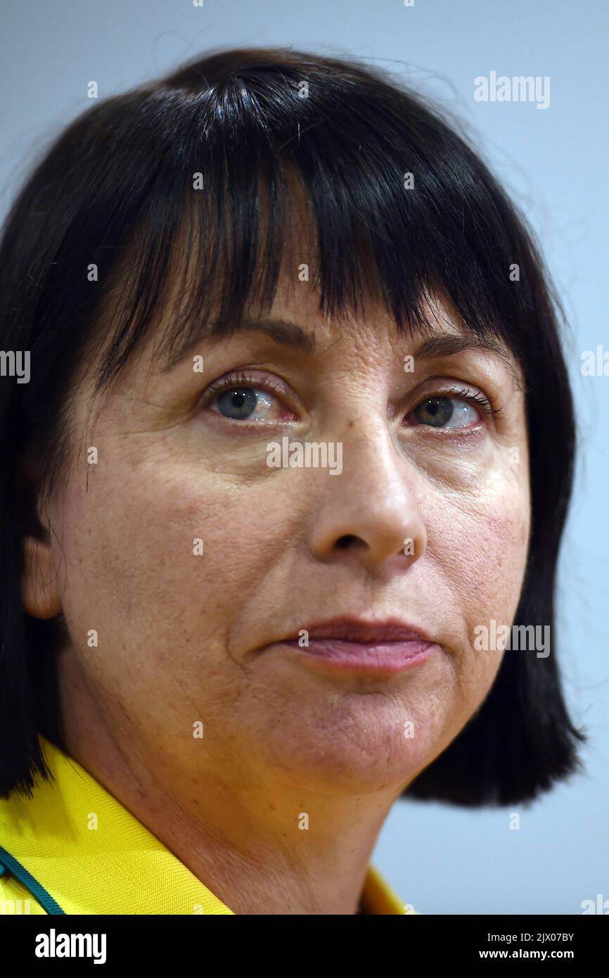 The coach of the Australian netball team, Lisa Alexander, listens to a ...