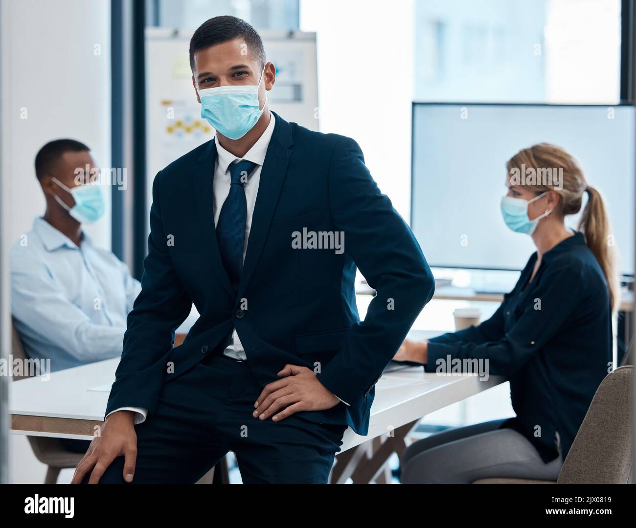 Businessman with covid face mask in meeting, leader in training ...