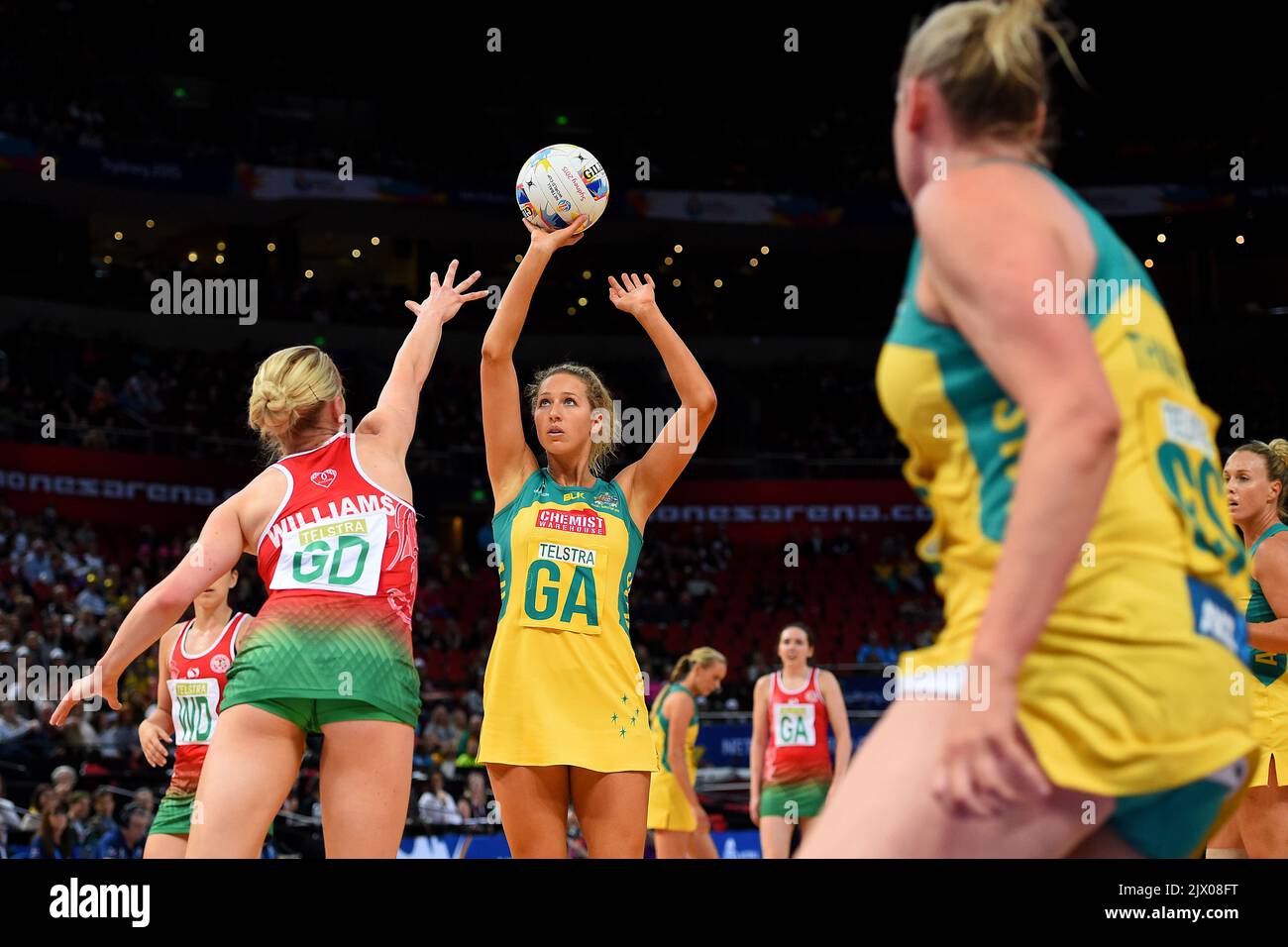 Erin Bell of Australia takes a shot at goal as Stephanie Williams of ...