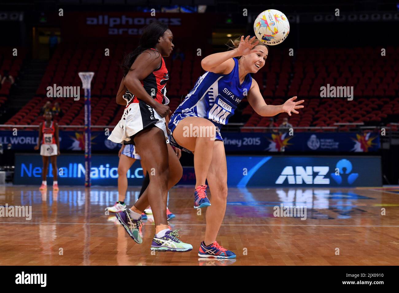Brooke Williams (right) of Samoa competes for the ball with Onella Jack ...