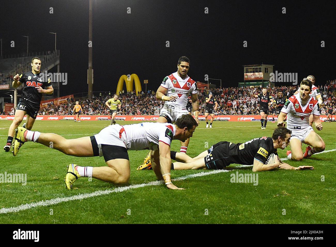 David Simmons of the Panthers scores during their round 24 NRL match ...