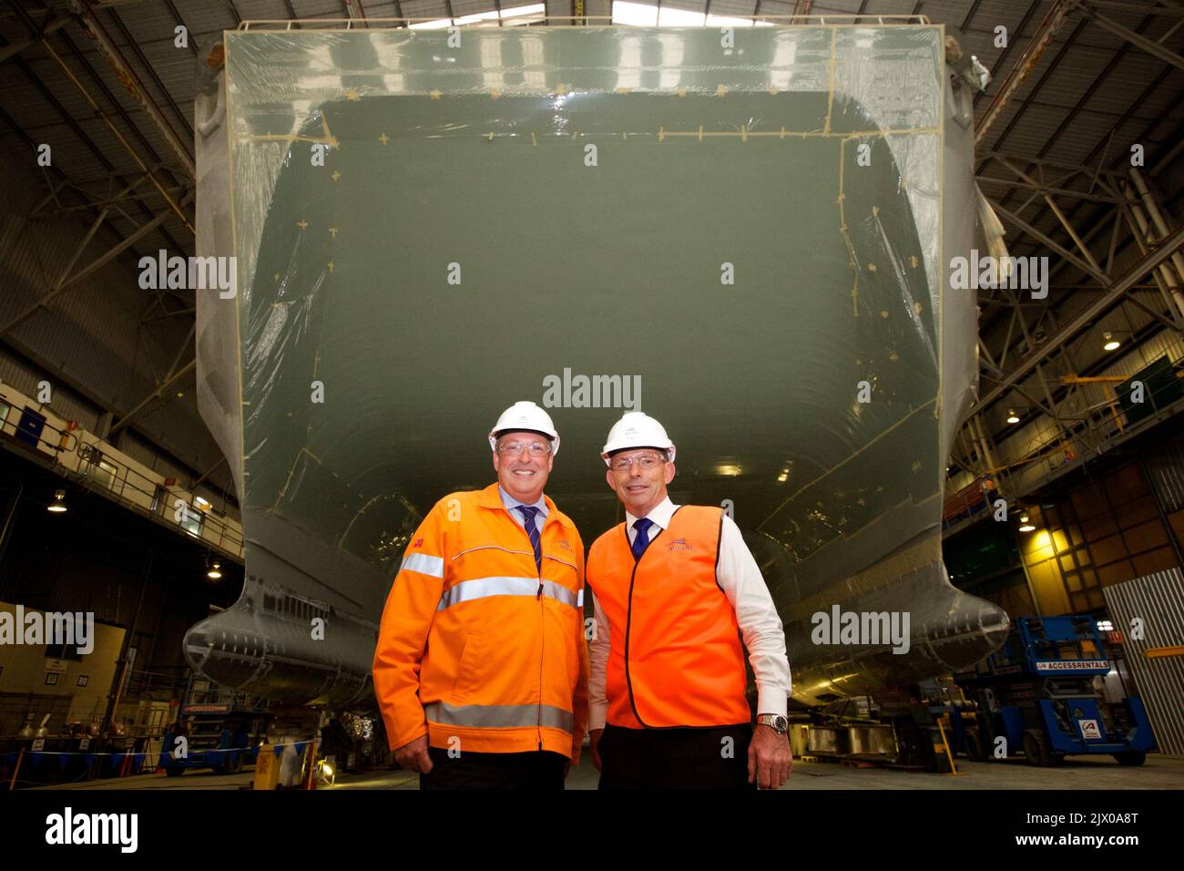 (R) Australian Prime Minister Tony Abbott with (L) Andrew Bellamy, CEO ...