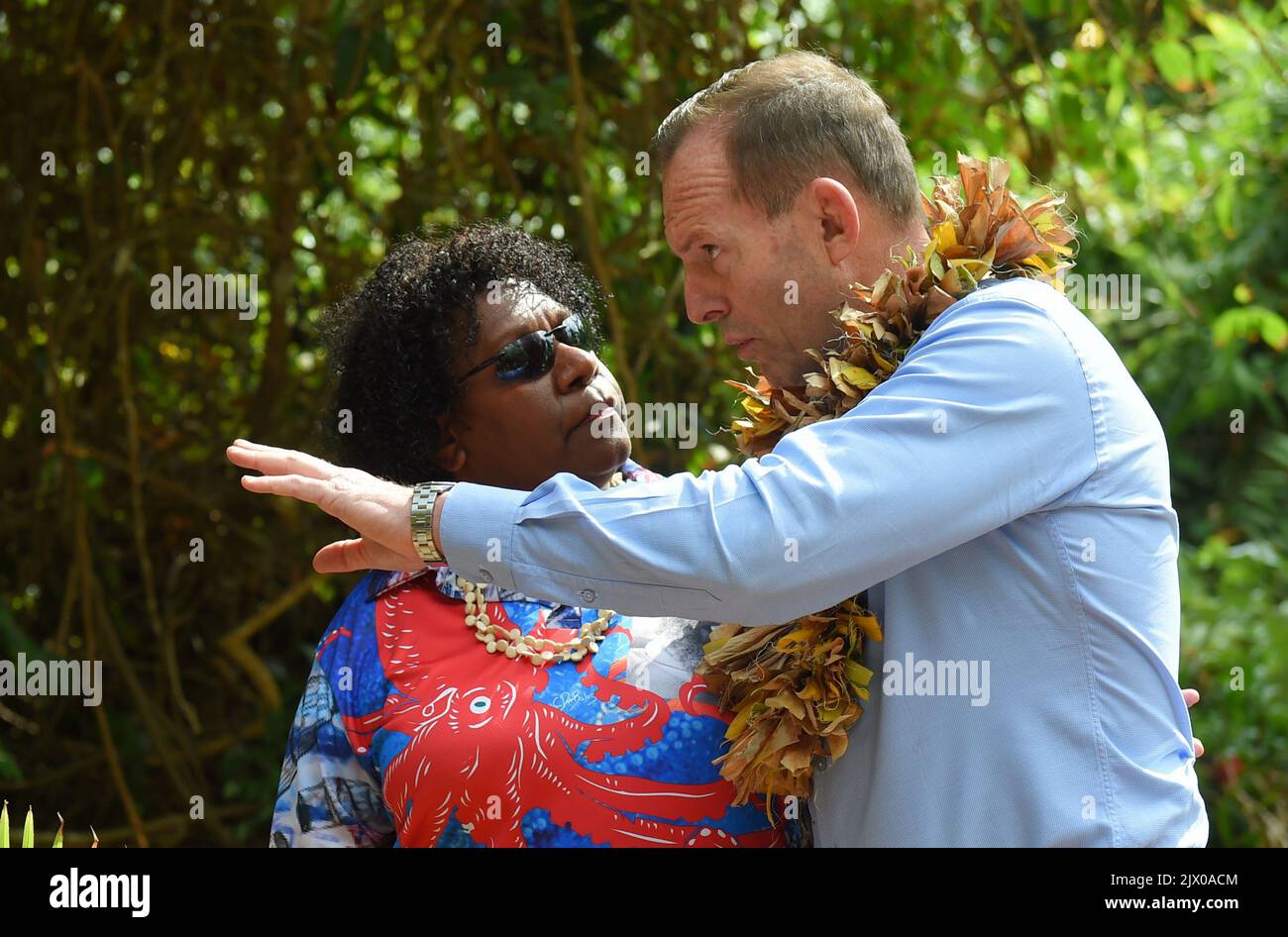 Prime Minister Tony Abbott and Gail Mabo lay a wreath on Eddie Mabo's ...
