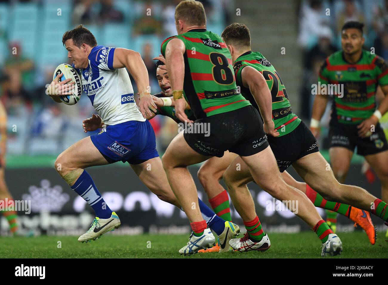 Brett Morris of the Bulldogs makes a break during the Round 24 NRL ...