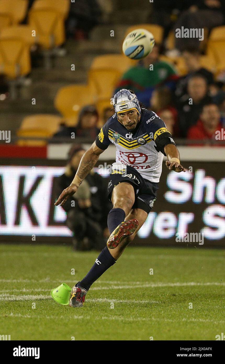 Captain Johnathan Thurston of the Cowboys kicks a conversion goal ...