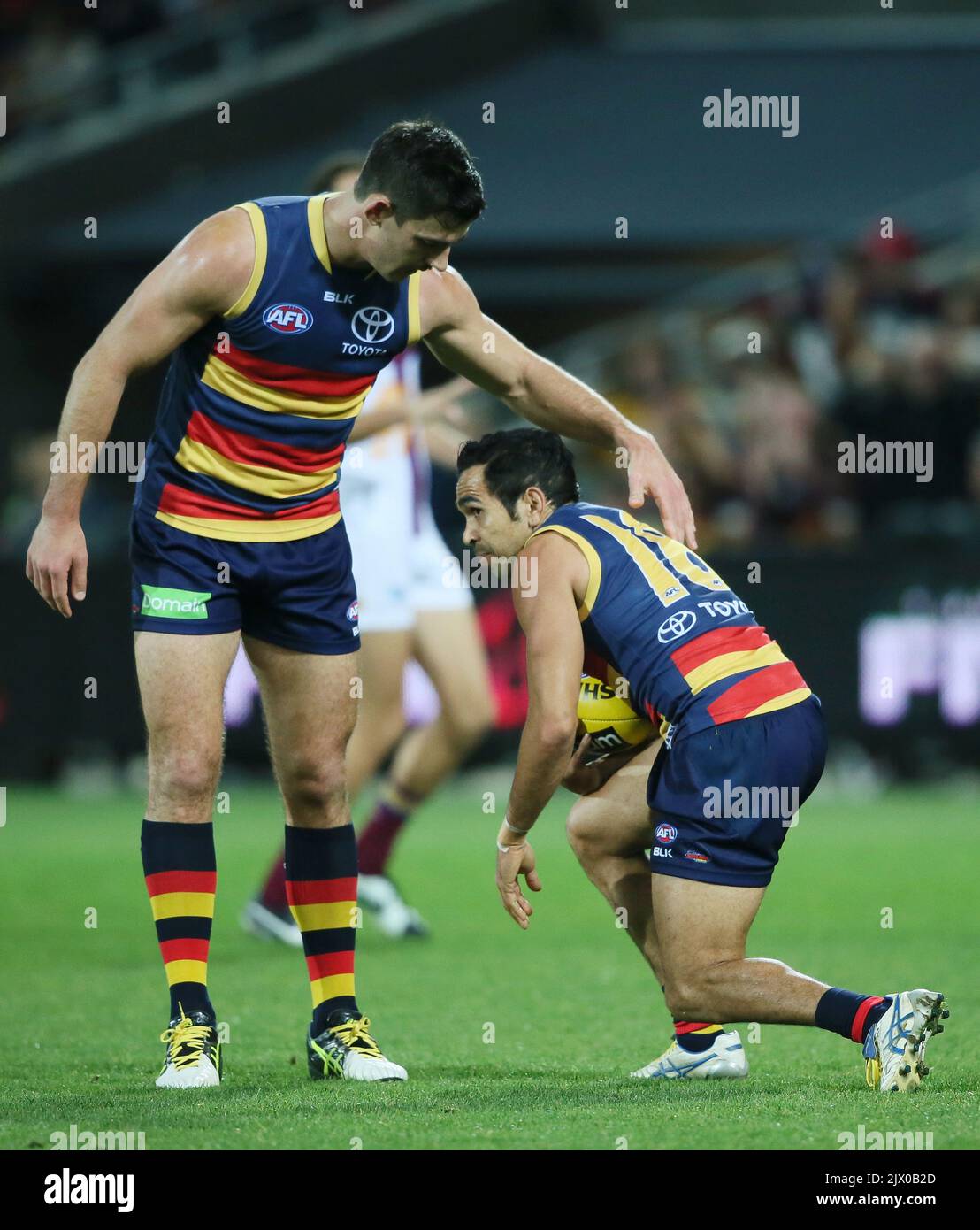 Taylor Walker of the Crows congratulates team mate Eddie Betts after ...