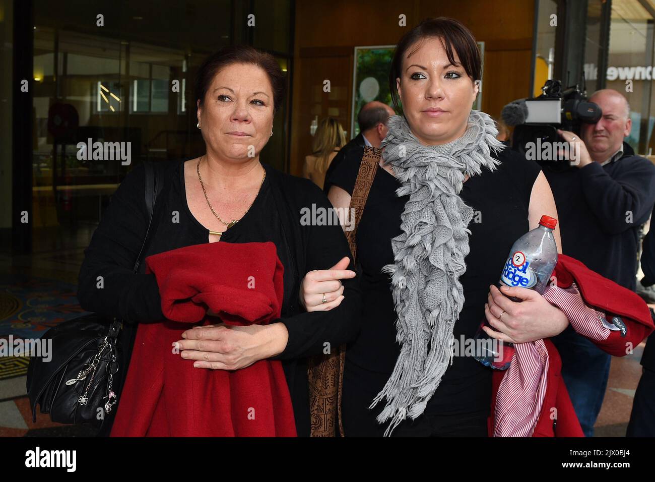 Michelle Fryer, (left), the mother of Kaileigh Fryer leaves the Downing ...