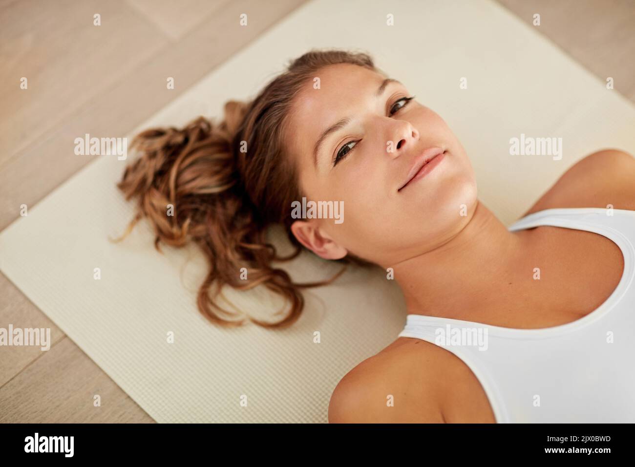 Enjoying some rest and relaxation after her workout. Cropped portrait ...