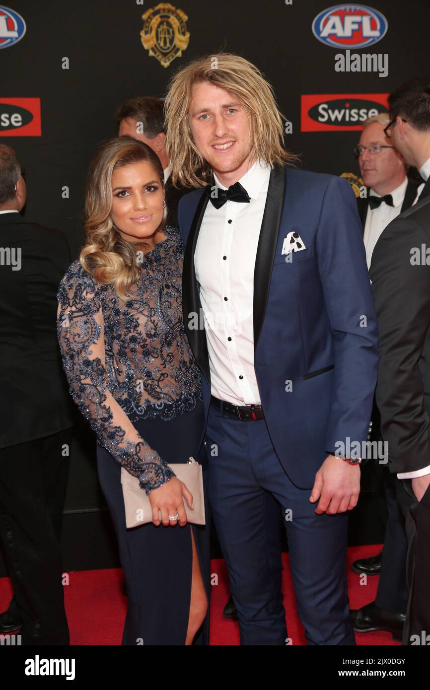 Essendon player Dyson Heppell and Kate Turner arrive at the Brownlow ...