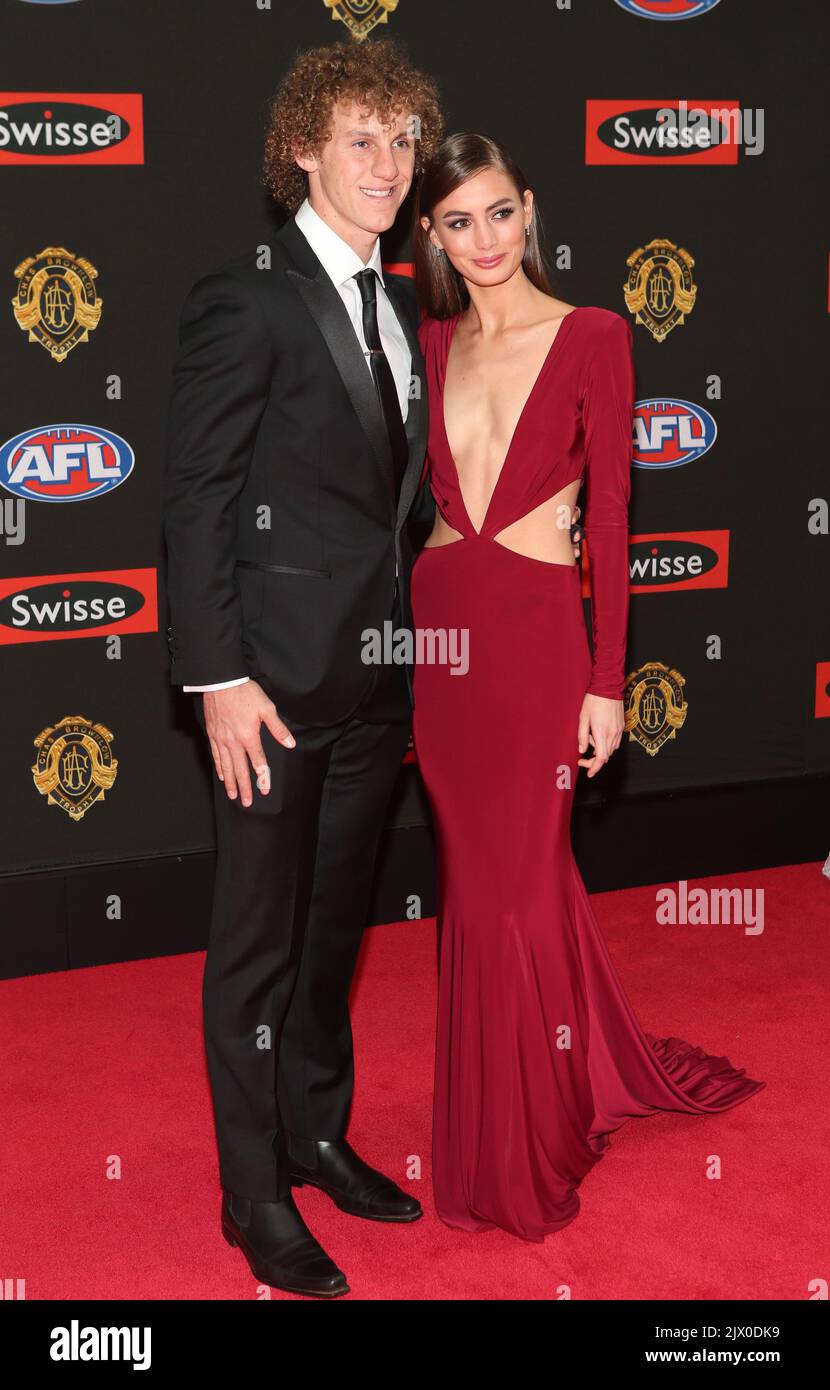 Fremantle player Chris Mayne and his partner Britt Nicholas arrive at ...