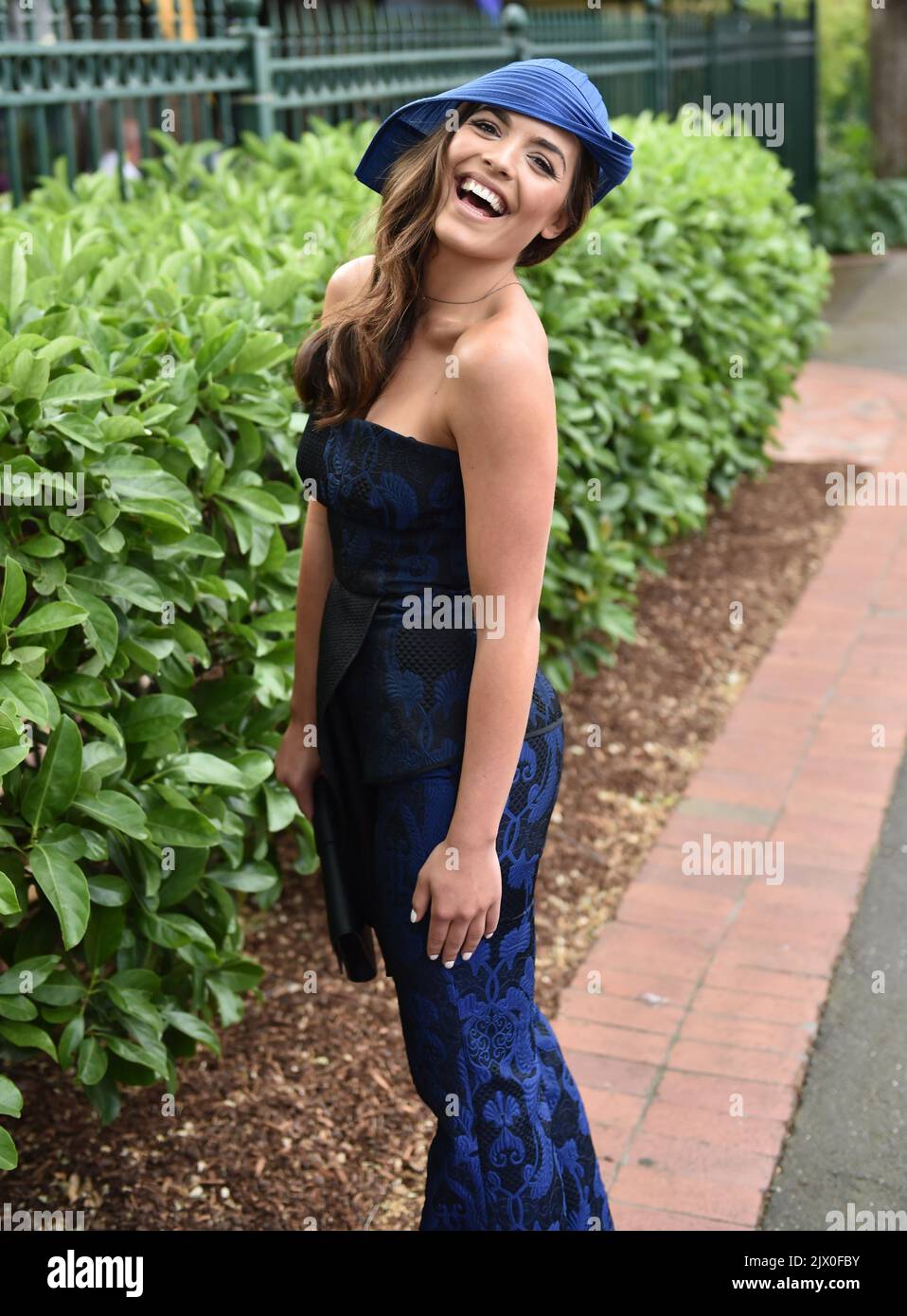 Olympia Valance poses for photos at Caulfield racecourse in Melbourne ...