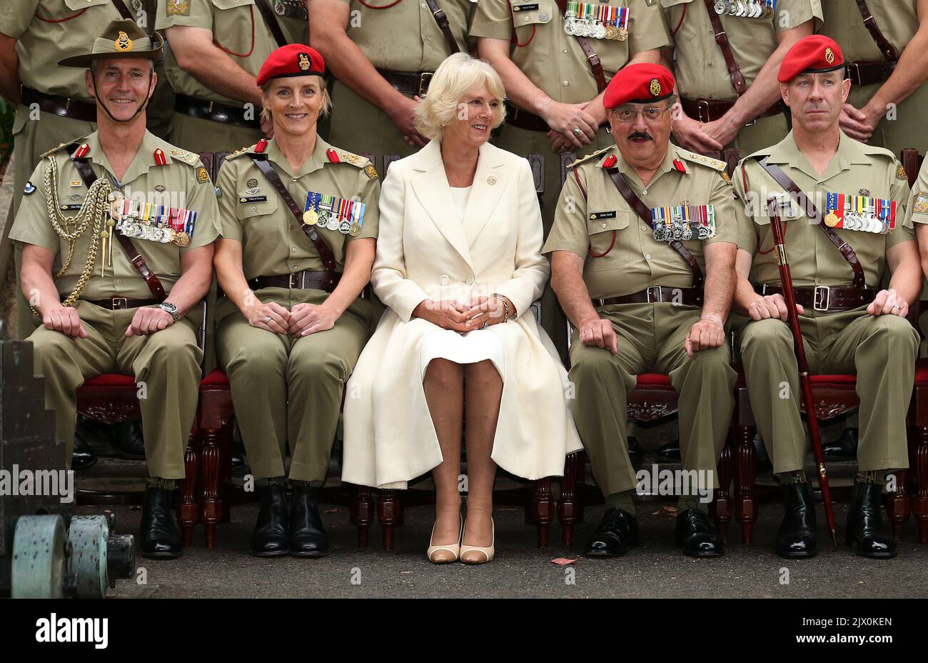 Britain's Camilla, Duchess of Cornwall, turns to speak to Col. John ...