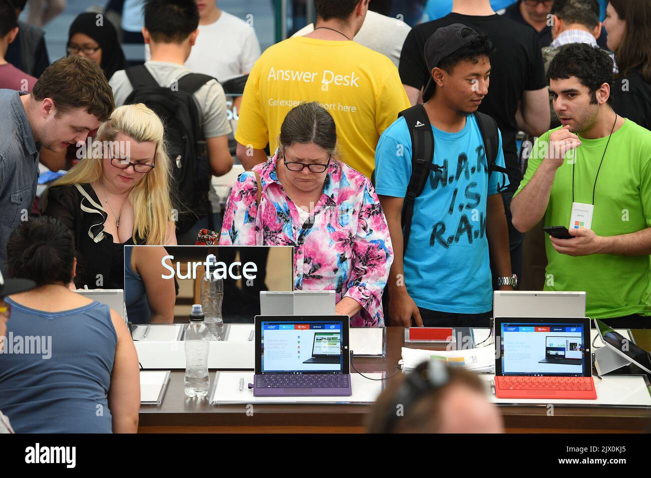 Customers are seen attending the grand opening of the Microsoft ...