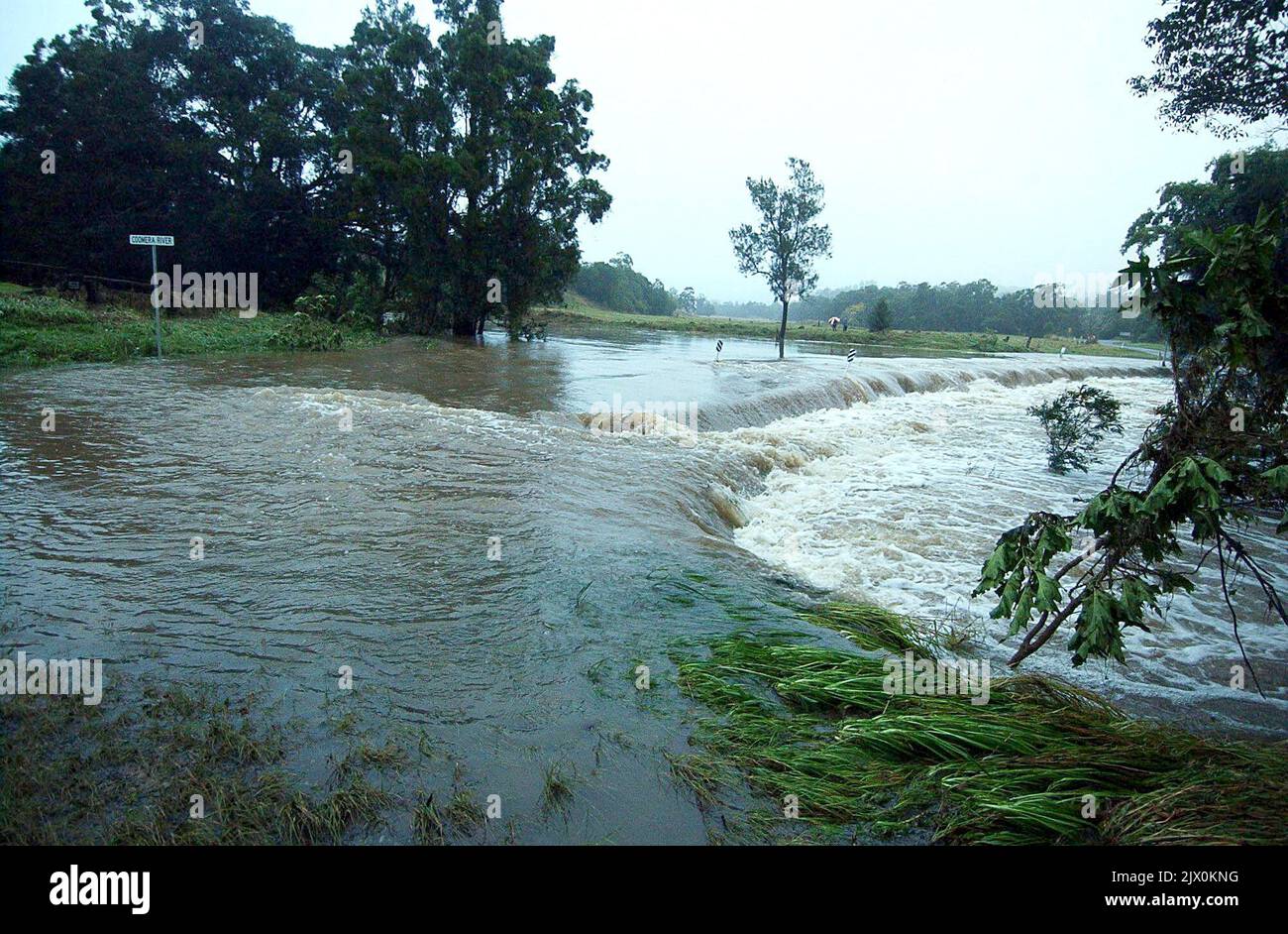 A flooded causway on the upper reaches of the Coomera River at ...