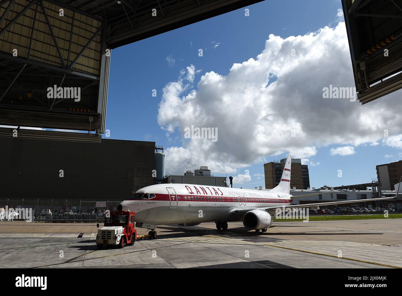 Qantas Retro Roo II is seen being towed into the hangar during the ...