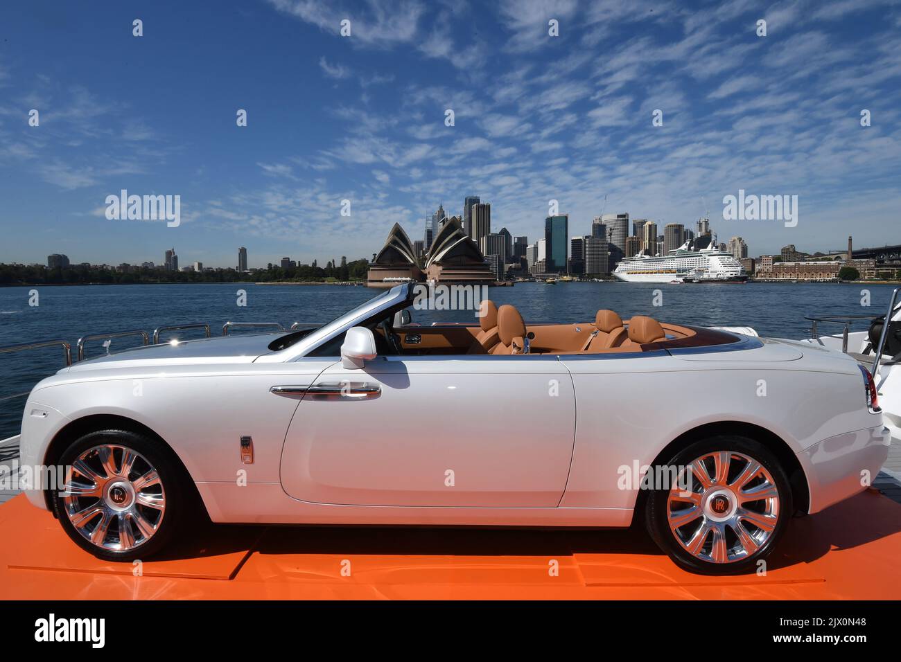 Rolls Royce unveils its new car, the Rolls Royce Dawn, set against the ...