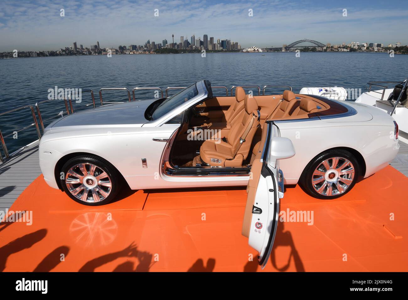 Rolls Royce unveils its new car, the Rolls Royce Dawn, set against the ...