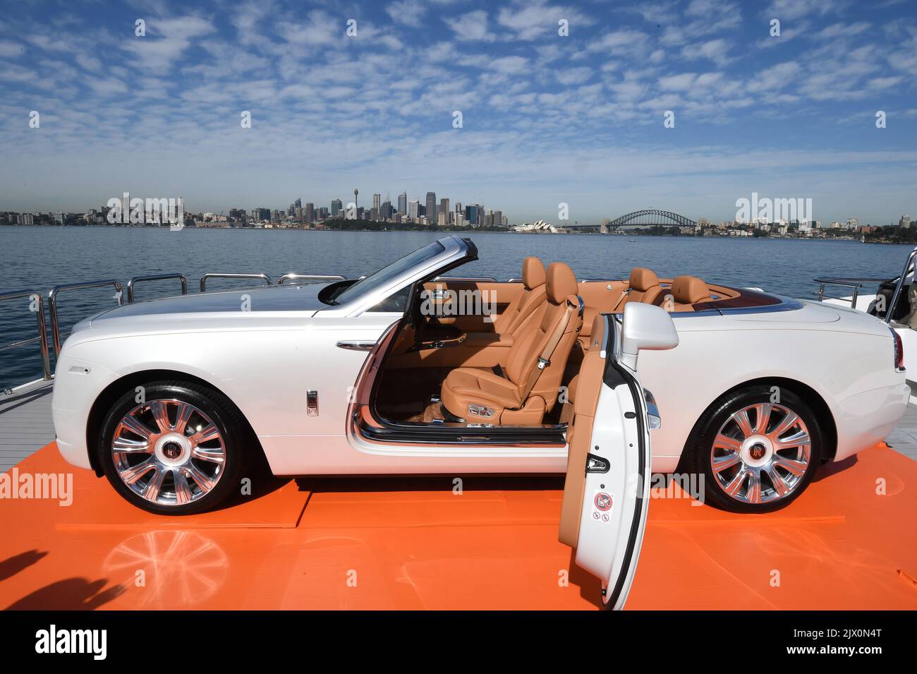 Rolls Royce unveils its new car, the Rolls Royce Dawn, set against the ...