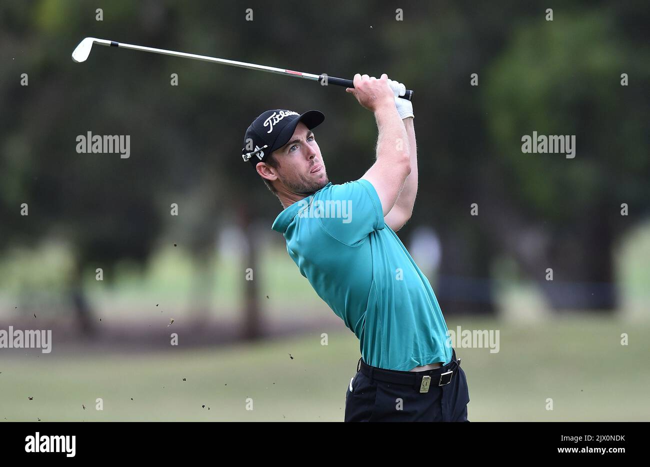 Australian golfer Nathan Holman plays a shot during the second round of ...