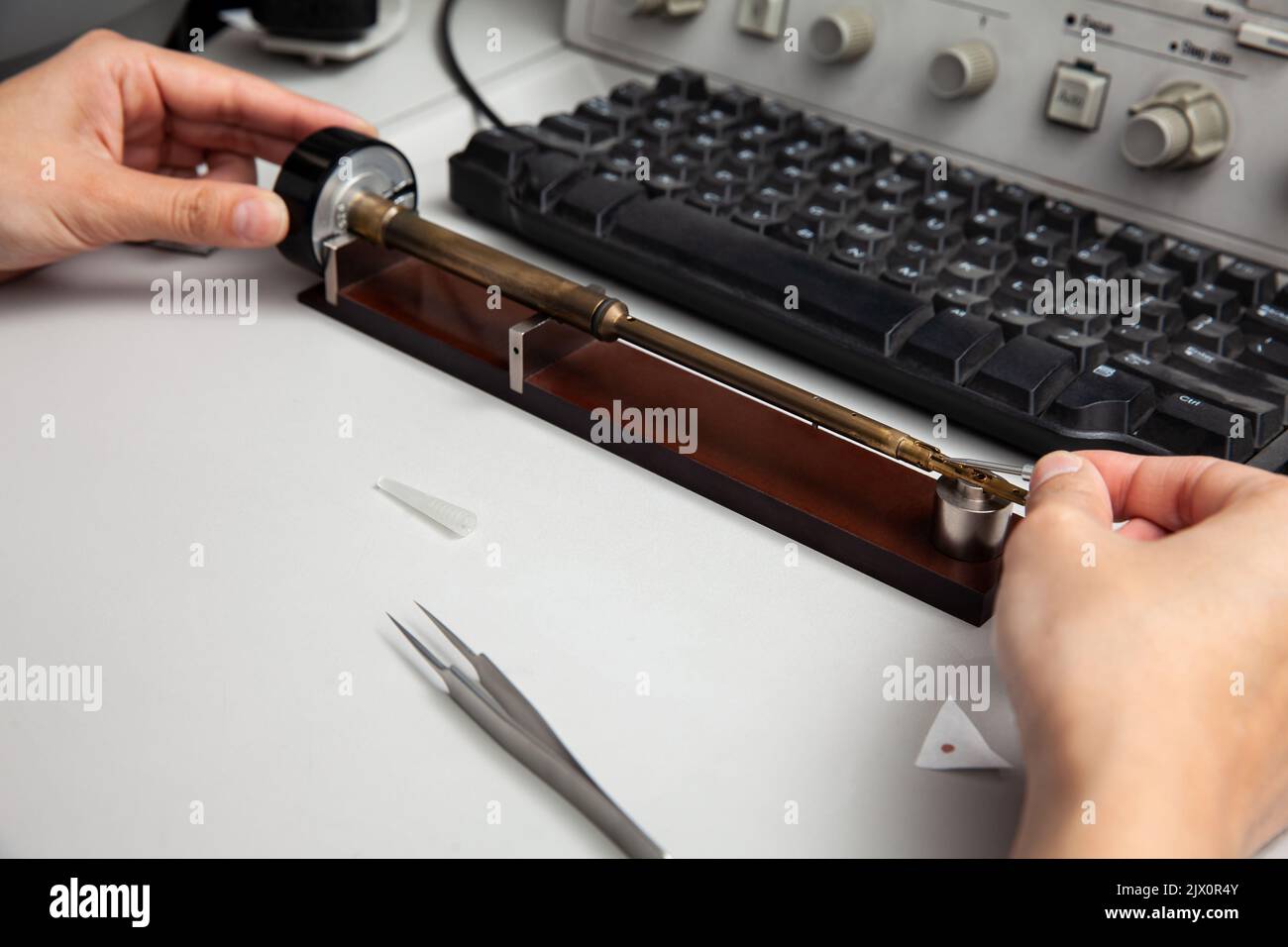 Transmission electron microscope sample holder been loaded with an ...